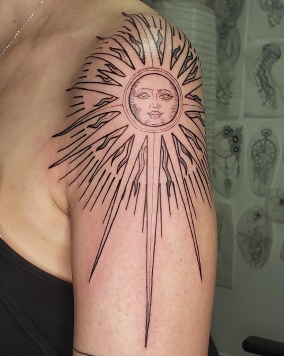 Black fine line shoulder tattoo of a sun and rays by tattoo artist ...